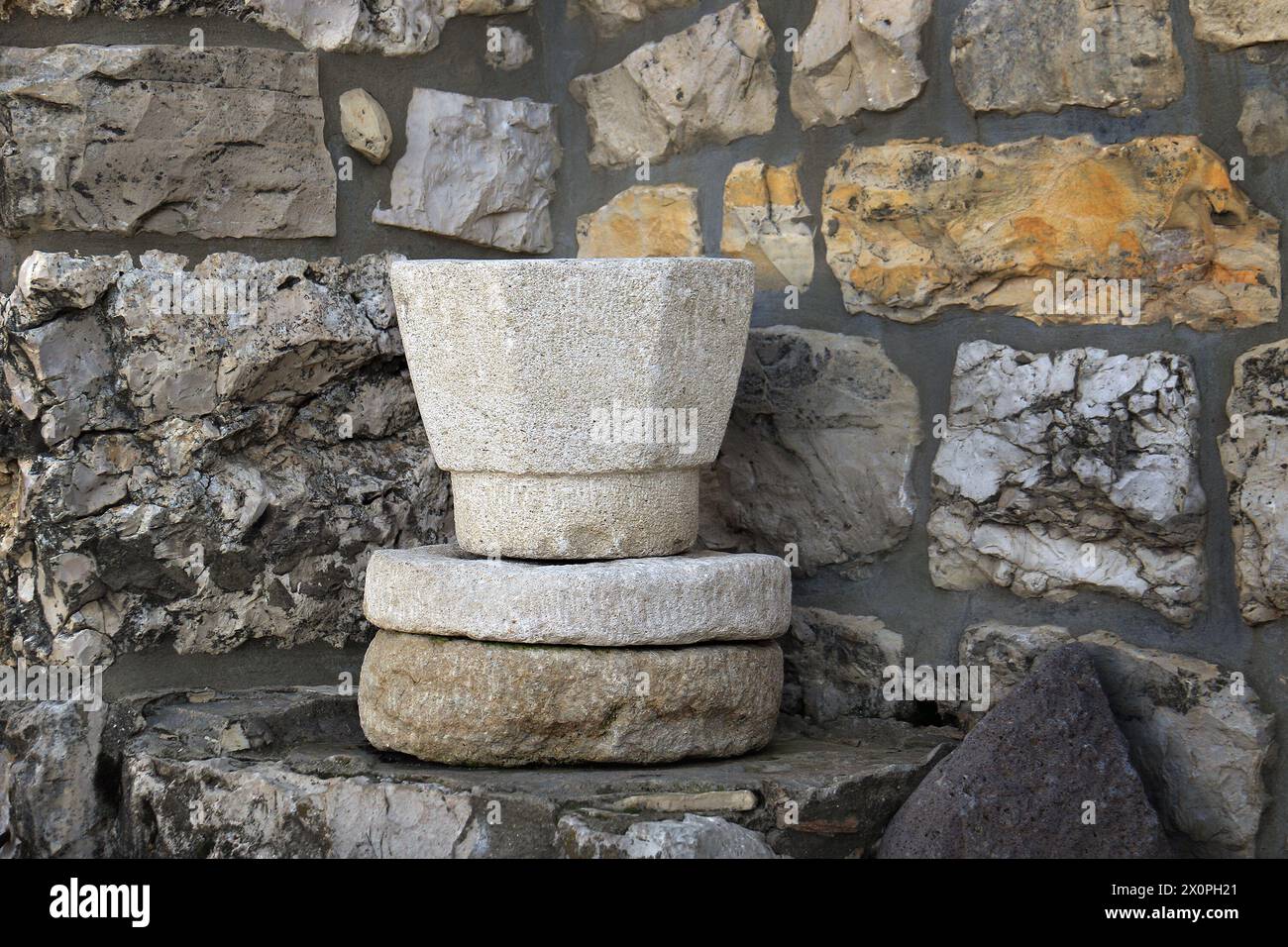 A traditional stone mortar traditionally used to make kibbeh in Lebanon ...