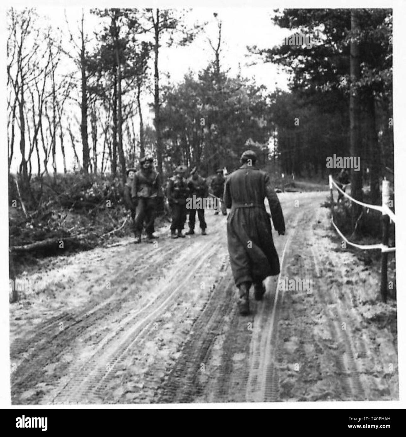 A lone German soldier surrenders and moves through British lines to P.O ...