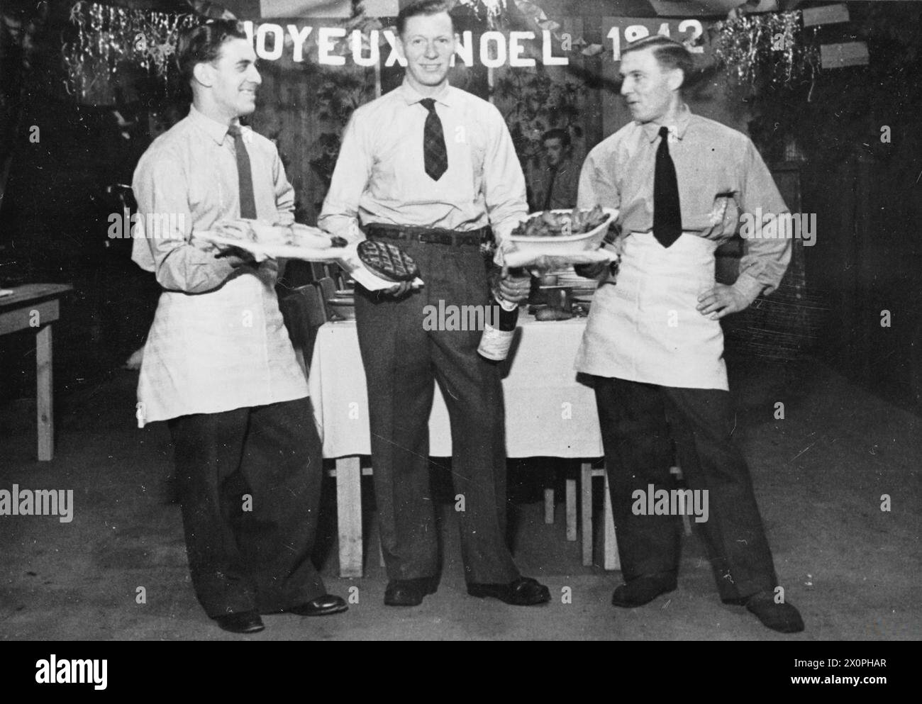 FRENCH PRISONERS OF WAR IN GERMANY, 1940-1945 - Three French POWs smile ...