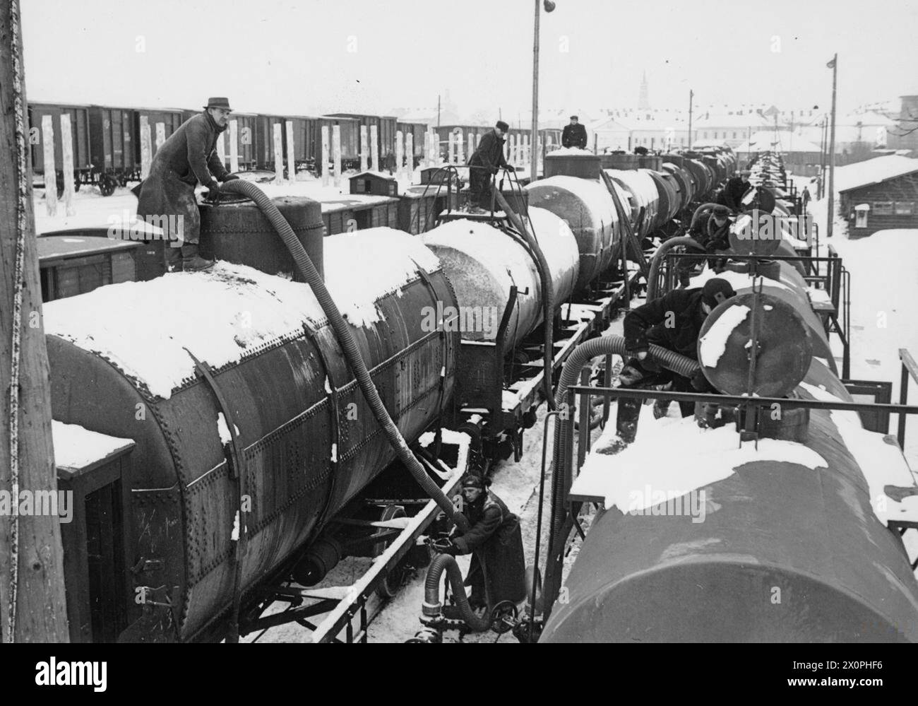 THE NAZI-SOVIET COOPERATION, 1939-1941 - Workers transferring oil from ...