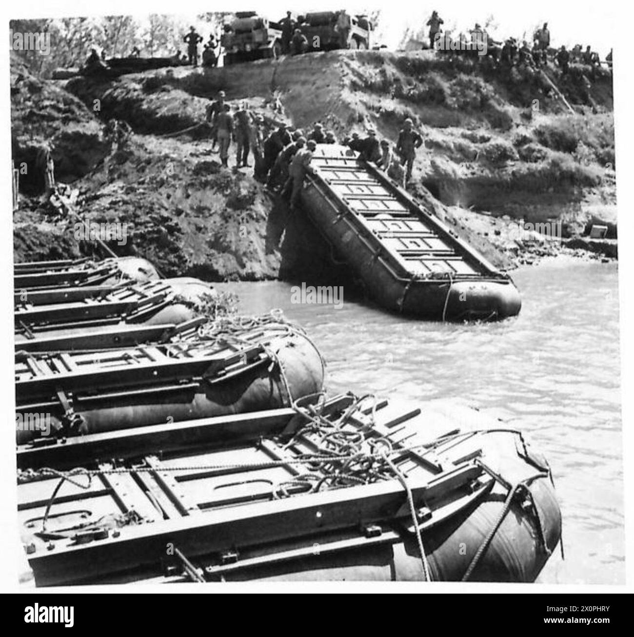 FIFTH ARMY : BRIDGING THE RIVER PO - Another rubber pontoon, inflated ...