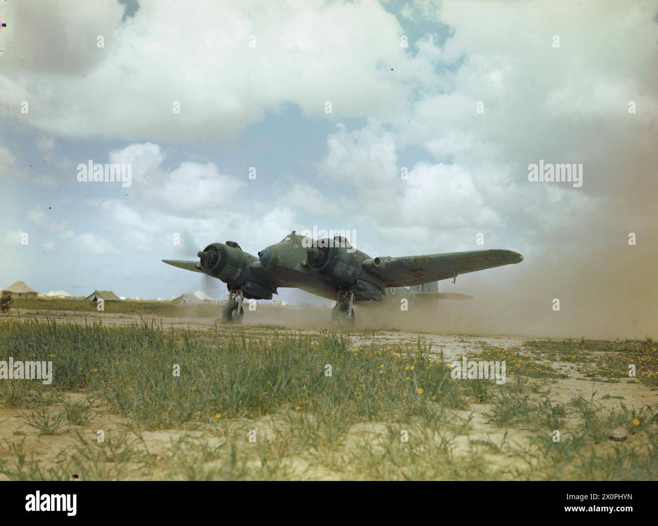 A Bristol Beaufighter Mk I of No. 252 Squadron strains at the chocks ...