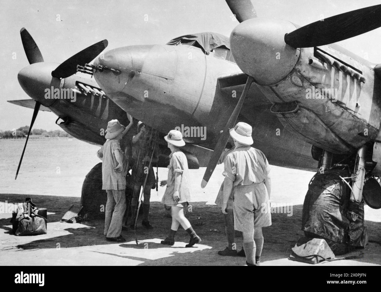 ROYAL AIR FORCE OPERATIONS IN THE FAR EAST, 1941-1945. - Airmen inspect ...