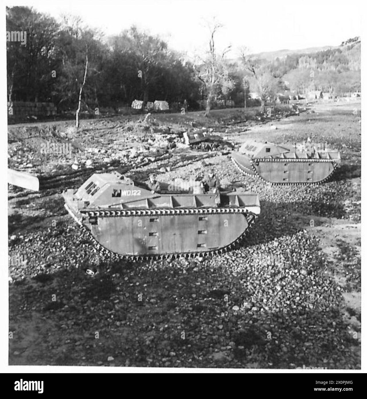 Amphibious military vehicles known as 'Alligators' are shown moving ...