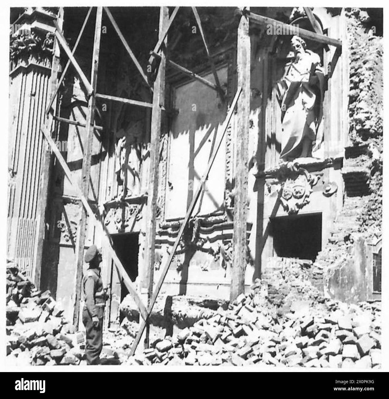 PRECISION BOMBING OF BOLOGNA - A British officer examines wreckage in ...