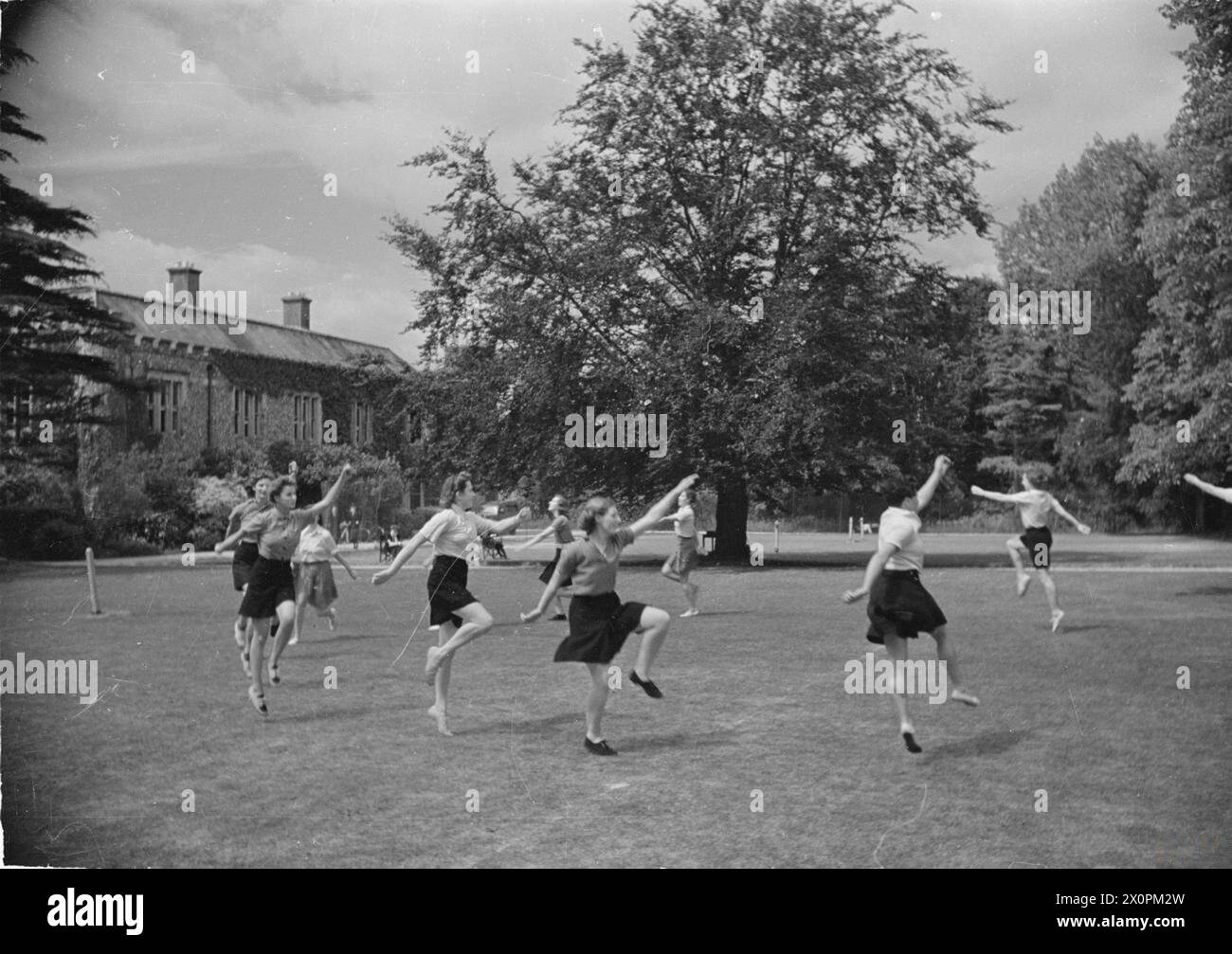 WRNS trainees perform physical training exercises at the W/T Naval ...
