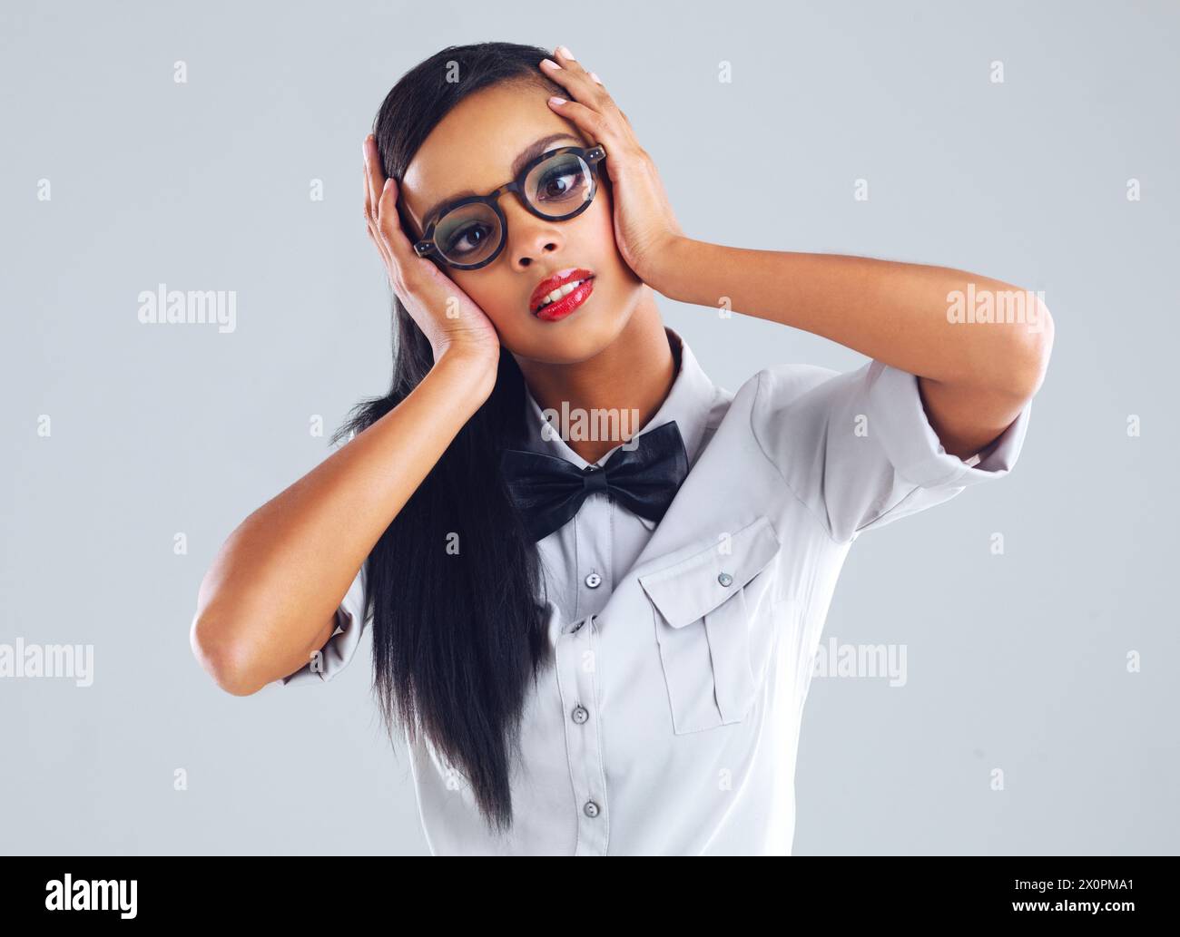 Funny, face and woman in studio confused with fashion of nerd or geek on background, mockup or ...