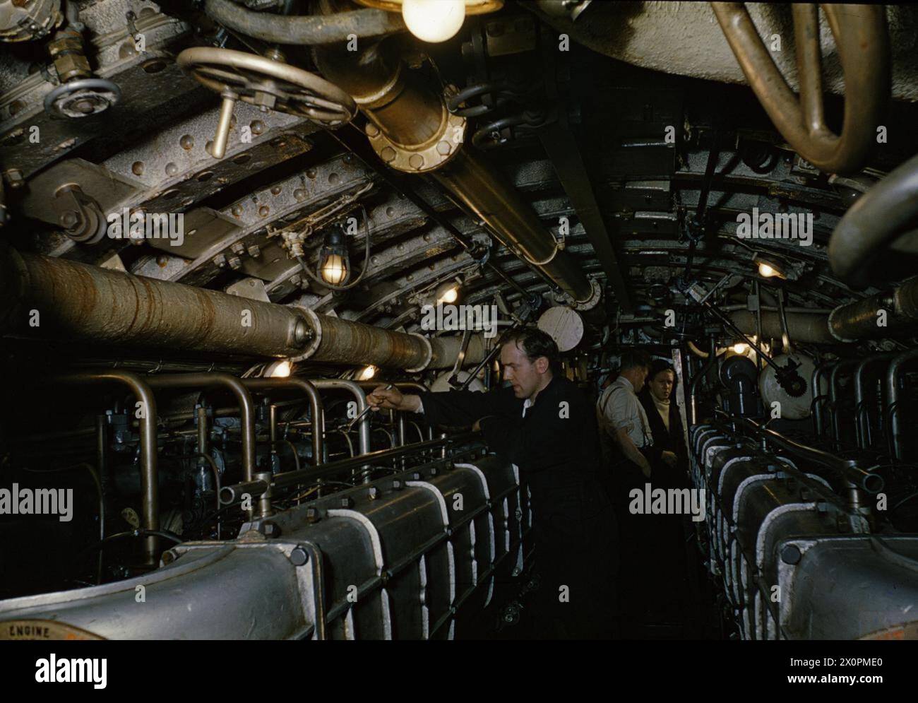 ON BOARD HM SUBMARINE TRIBUNE, 1942 - The engine room on board HMS ...