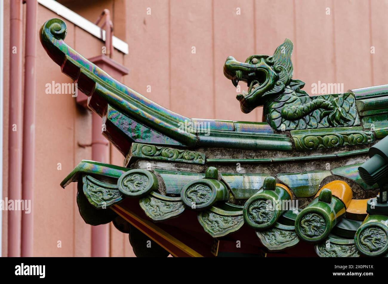 A close-up view of a beautifully intricate dragon sculpture that forms ...