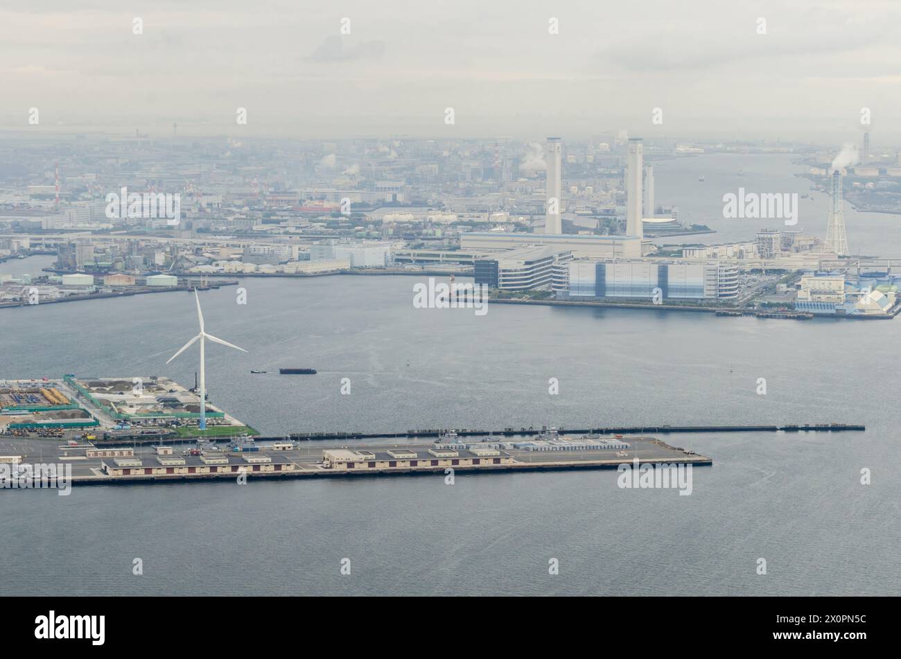 The aerial vantage point provides a sweeping view of a port citys ...