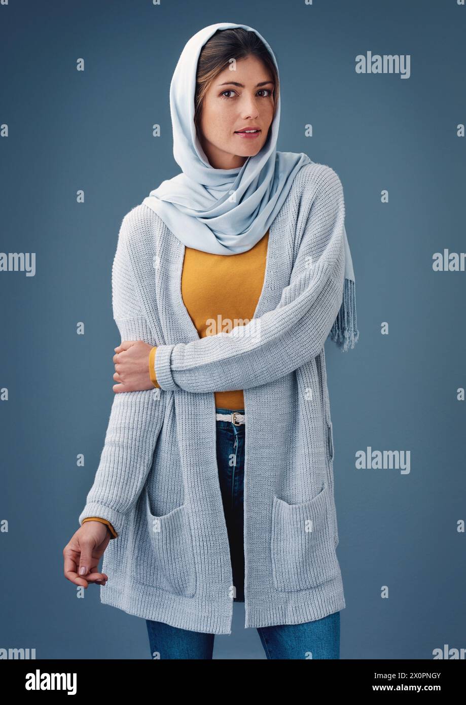 Portrait, studio and fashion with arab woman, clothes for Ramadan with ...