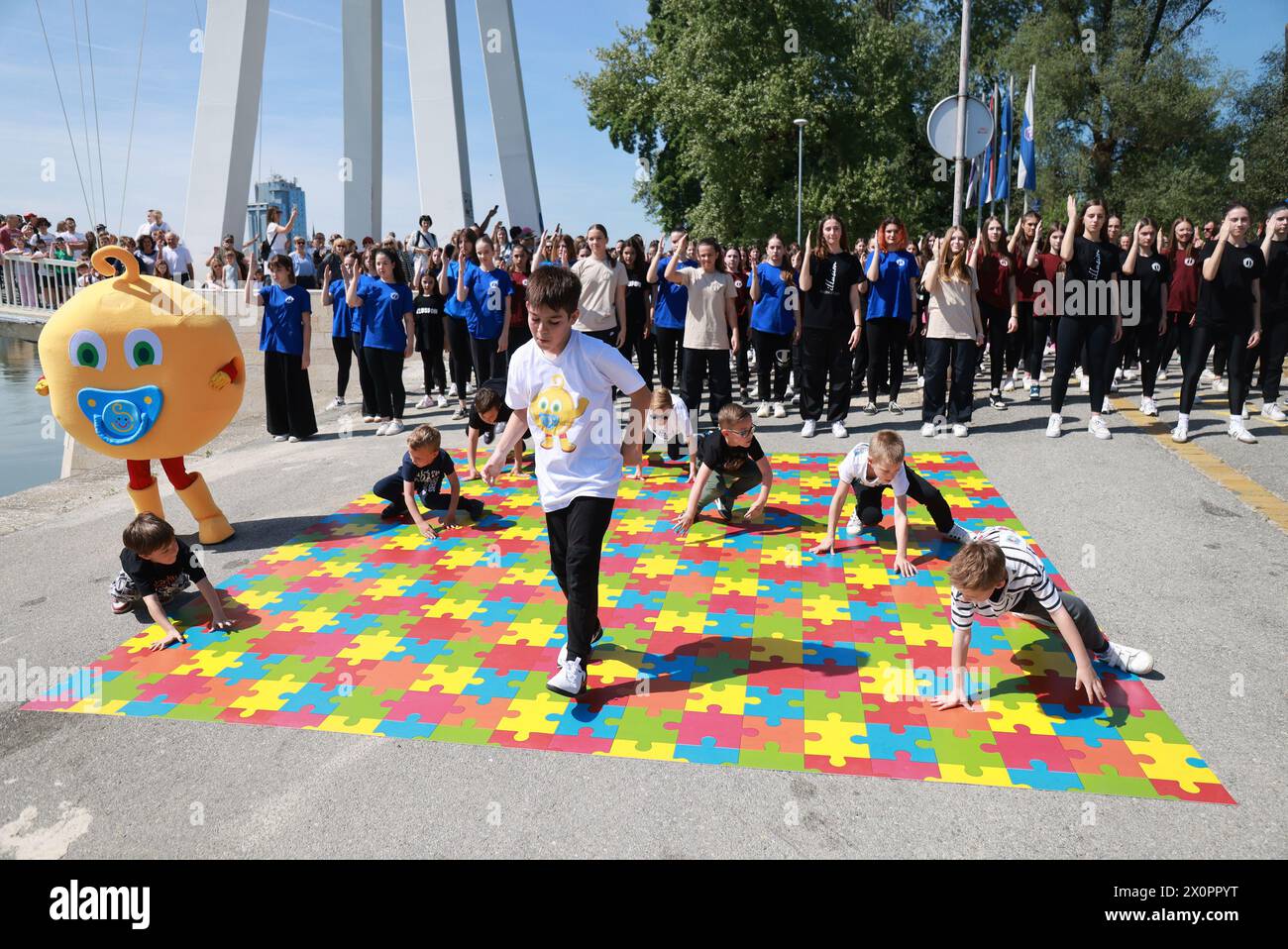 People dance in the rhythm of Rim Tim Tagi Dim song to show support to ...