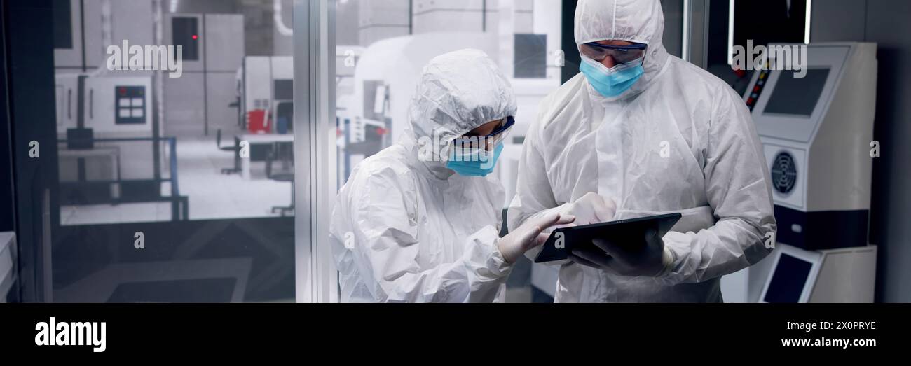 Worker in a sterile factory conducting OSHA inspection Stock Photo - Alamy