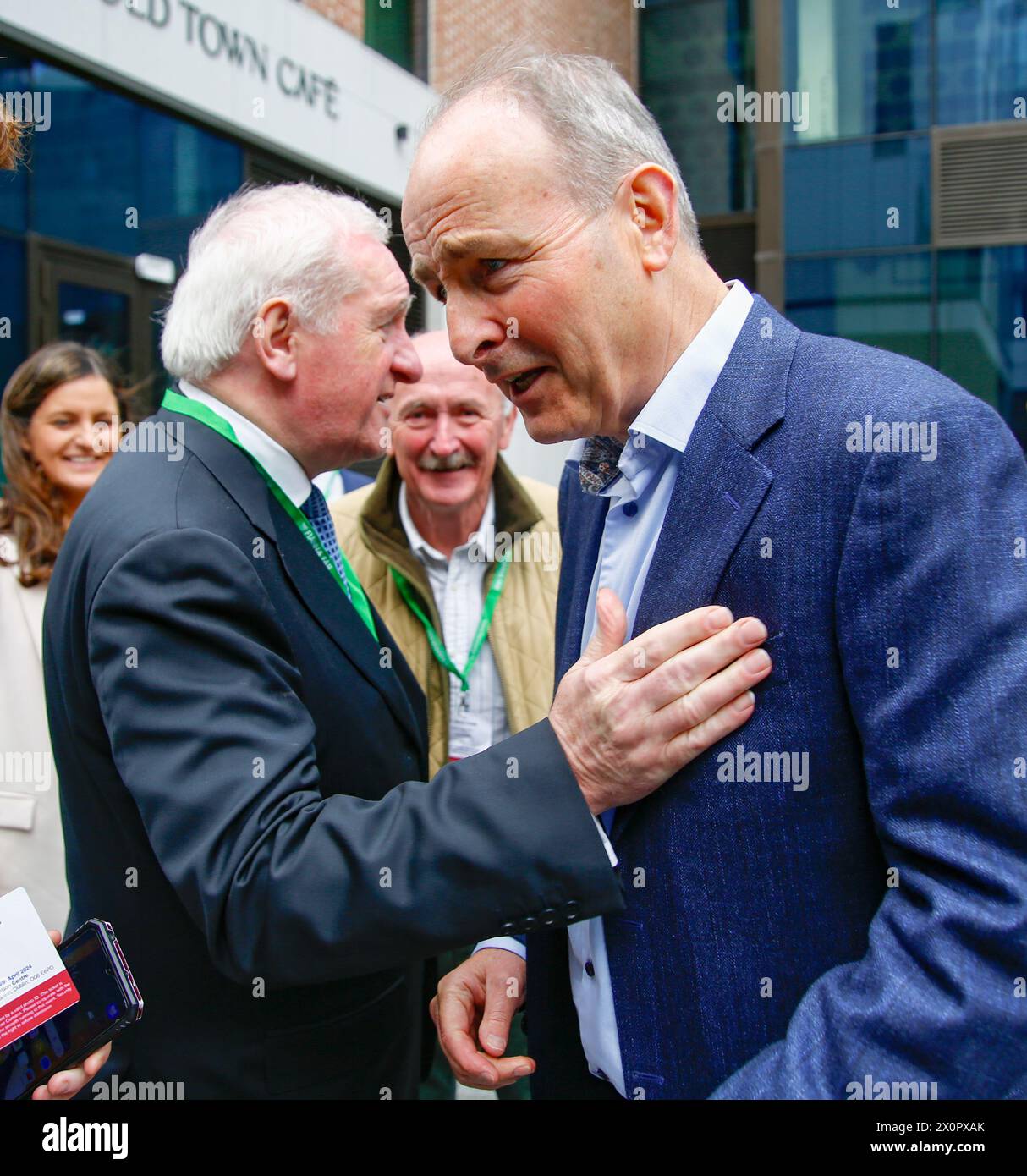 Former Taoiseach Bertie Ahern meets and shakes hands with current Fianna Fail leader and ...