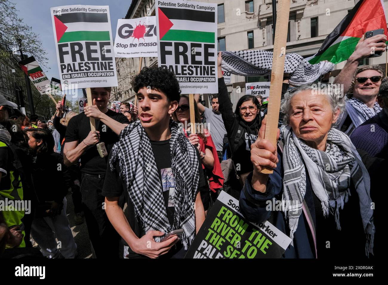 People take part in a pro-Palestine march in central London organised ...