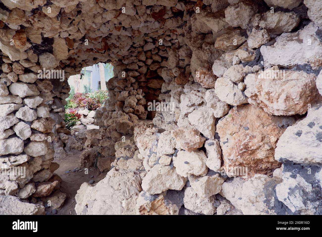A Rocky Cave Entrance in Bali Stock Photo - Alamy