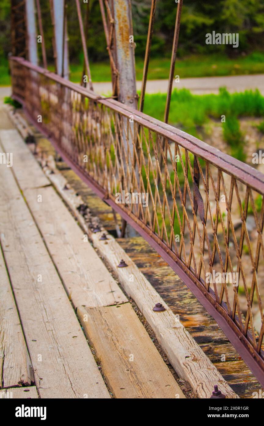 A close-up perspective of a rustic bridge invites contemplation of ...