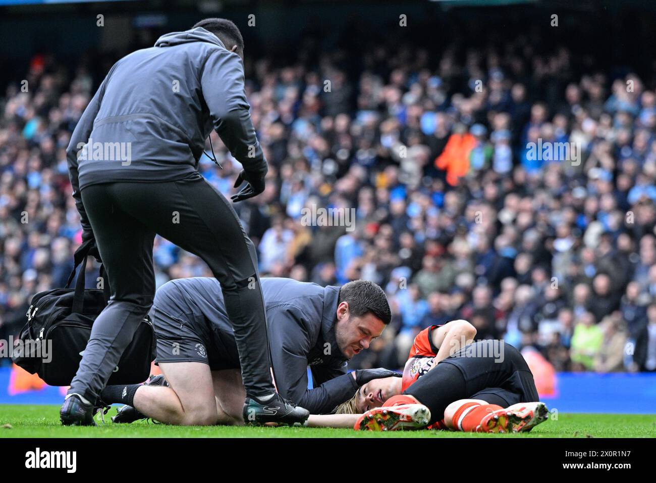 Daiki Hashioka of Luton Town goes down with a head injury, during the ...