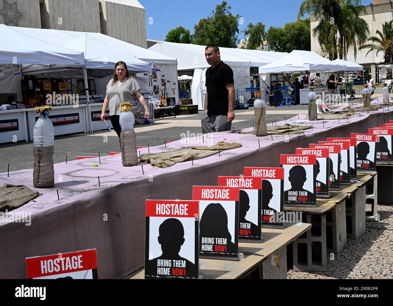 Tel Aviv, Israel. 13th Apr, 2024. People visit an empty table with ...