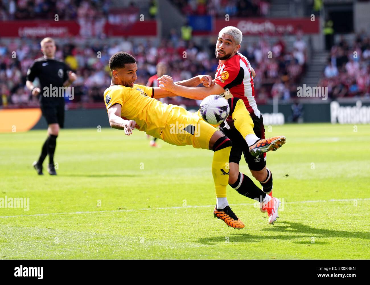 Sheffield United's Mason Holgate goes down whilst battling for the ball ...