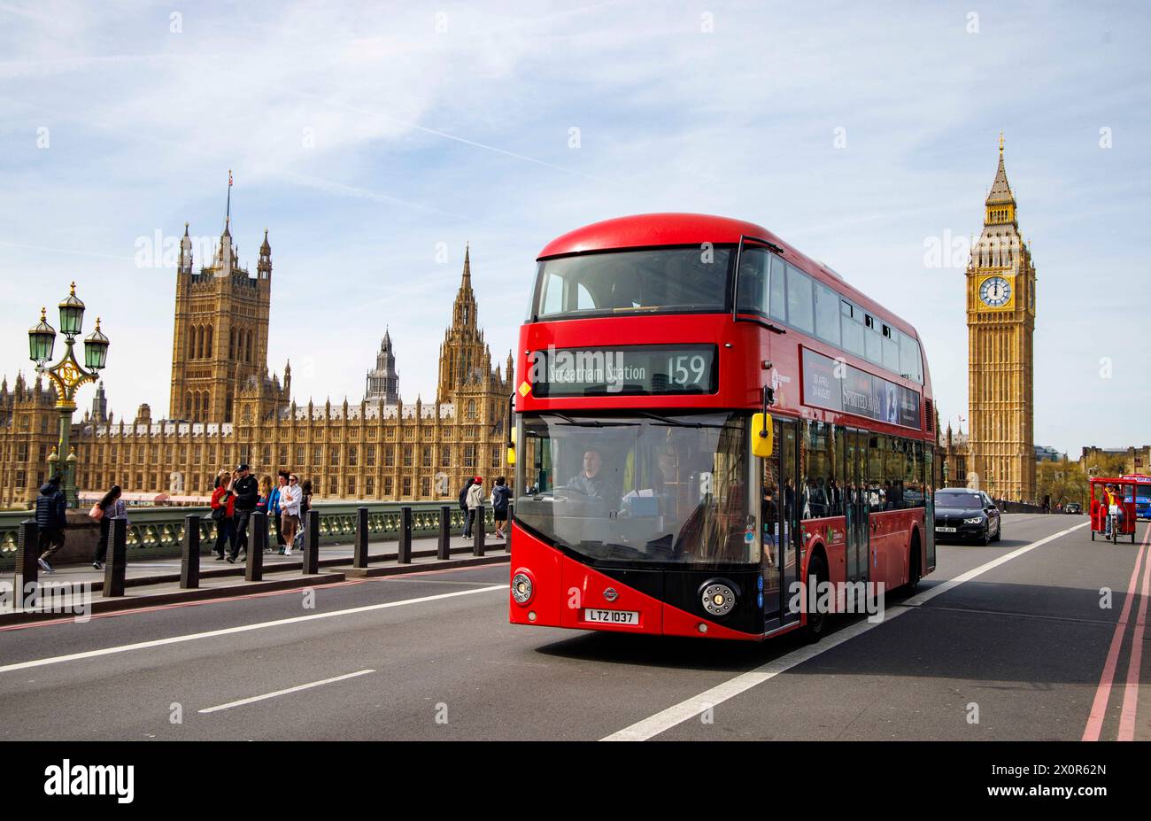 Classic View of Houses of Parliament with Big Ben and a red London bus ...