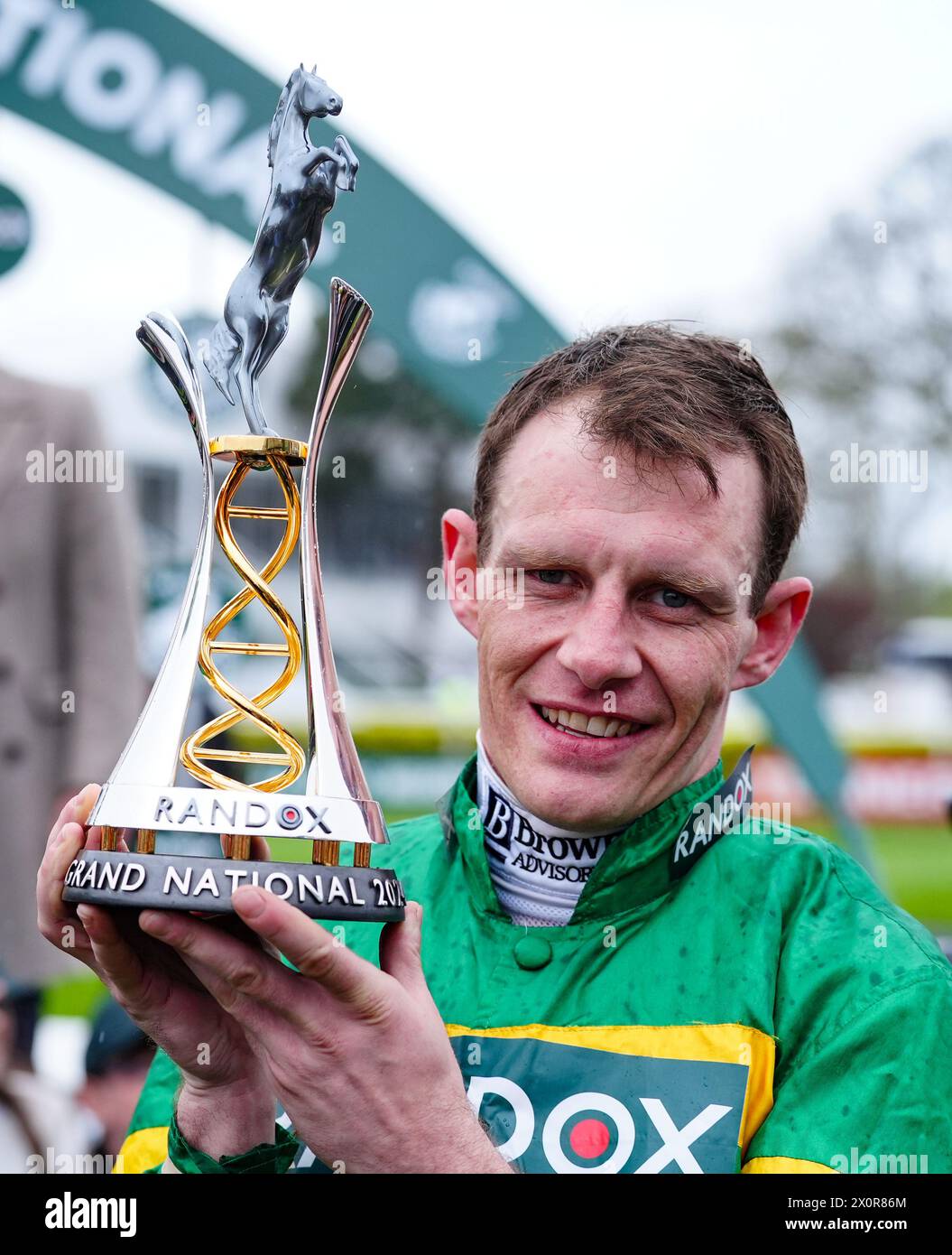 Jockey Paul Townend with the trophy after winning the Randox Grand ...