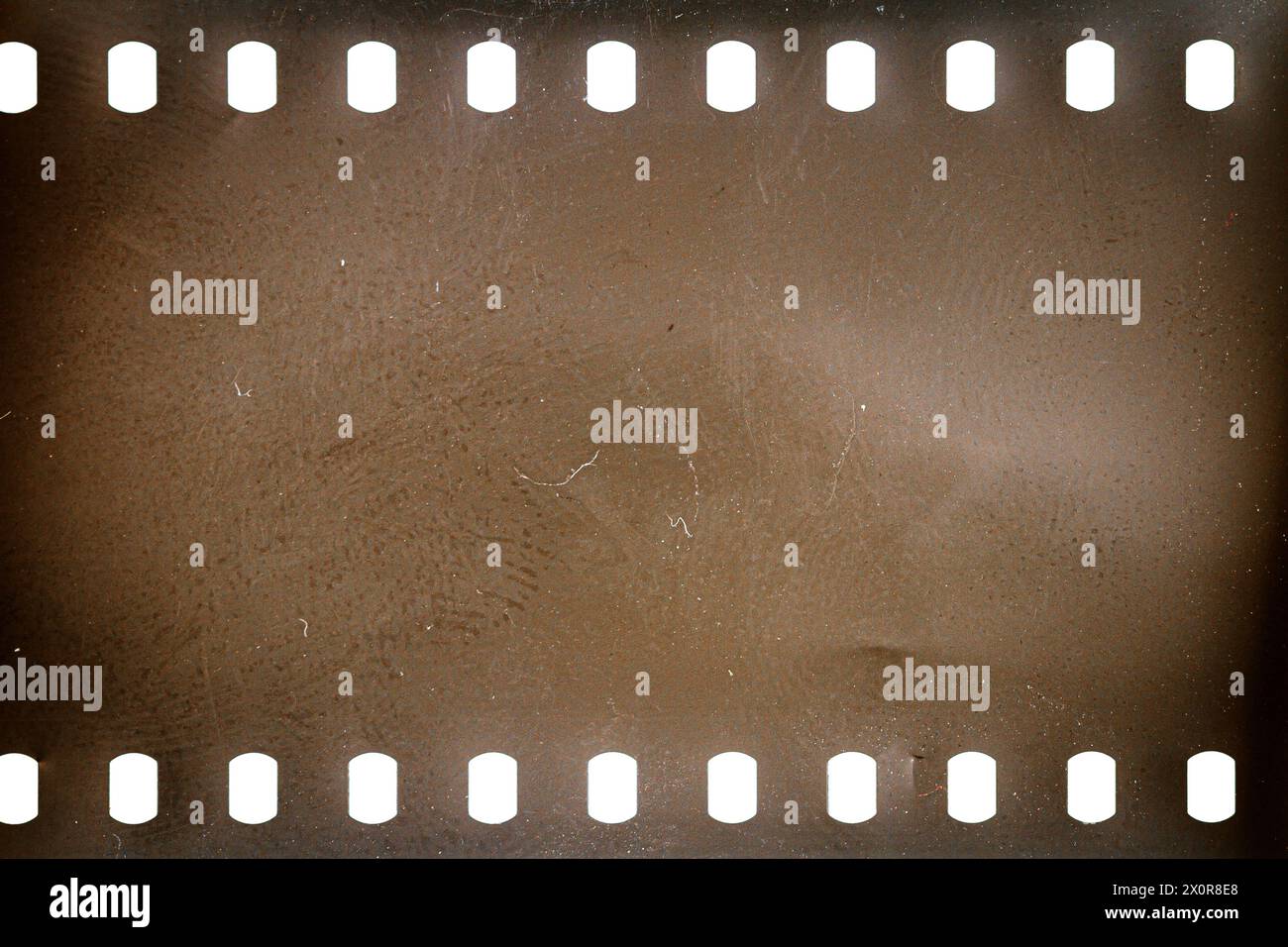 Dusty and grungy 35mm film texture or surface. Perforated scratched ...