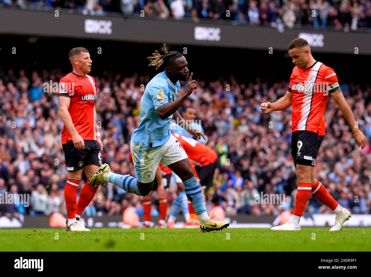 Manchester City's Jeremy Doku celebrates scoring their side's fourth ...