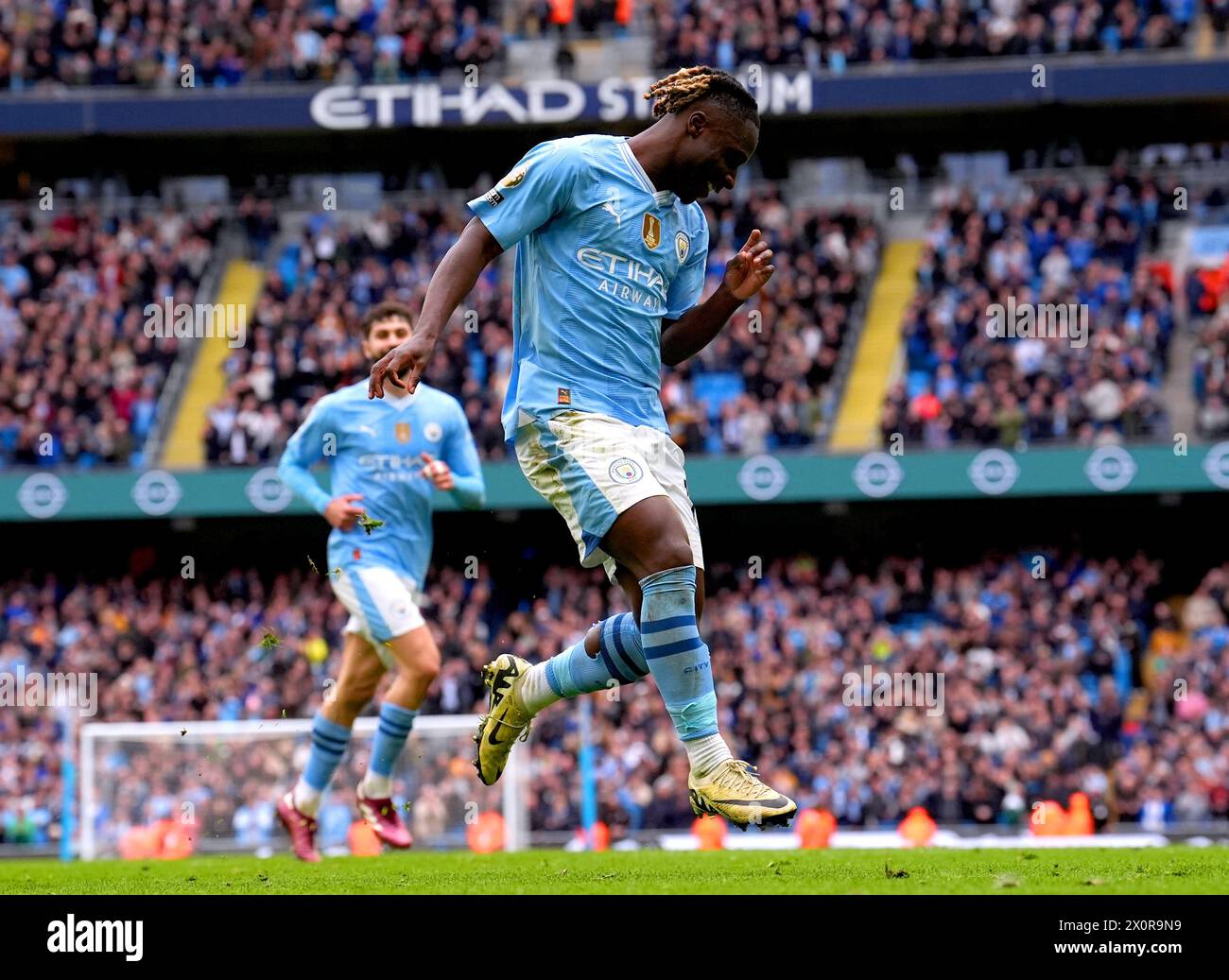 Manchester City's Jeremy Doku celebrates scoring their side's fourth ...