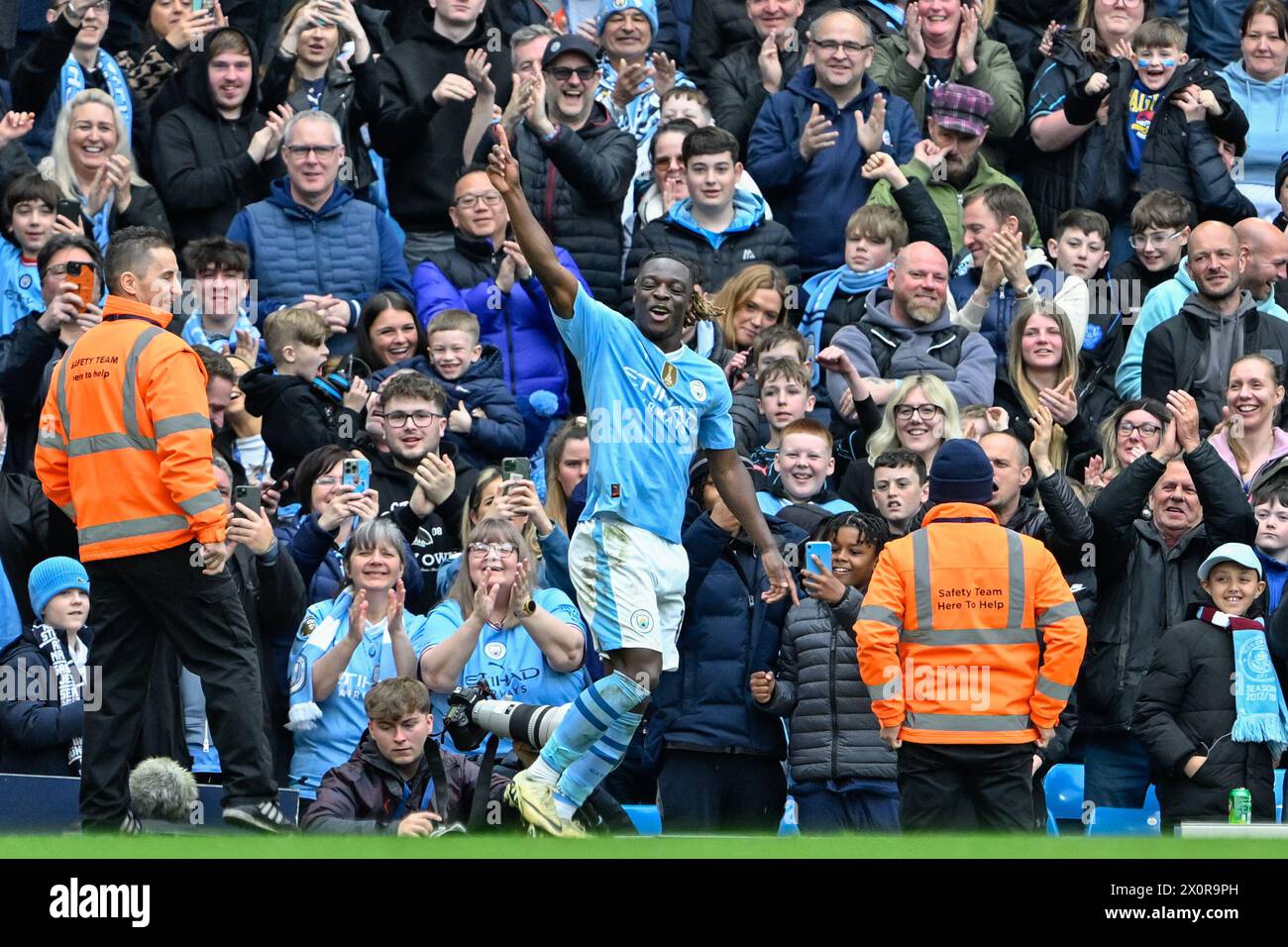 Jérémy Doku of Manchester City celebrates his goal to make it 4-1 ...
