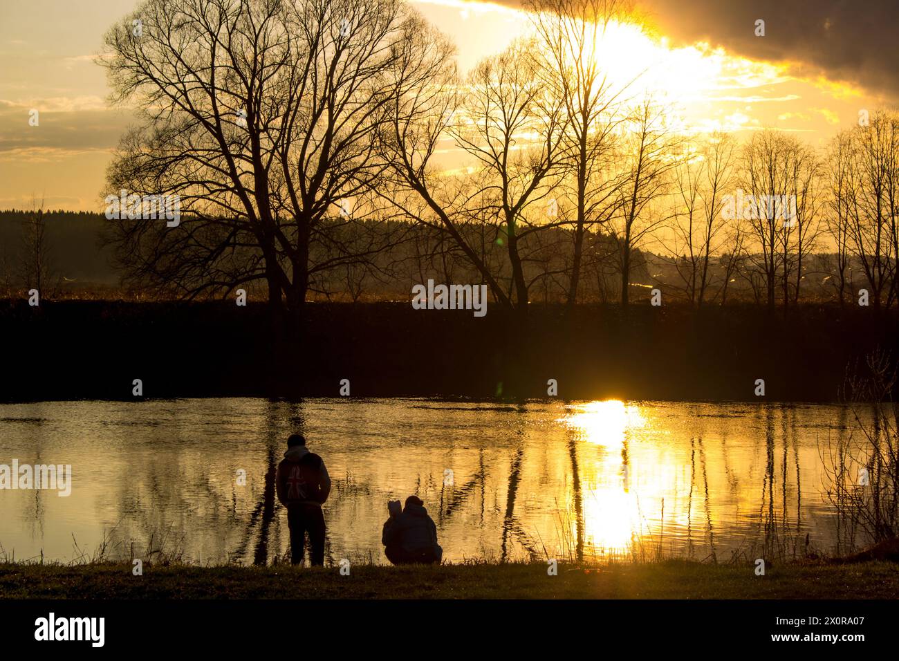 Beautiful yellow sunset against the background of the river Stock Photo ...