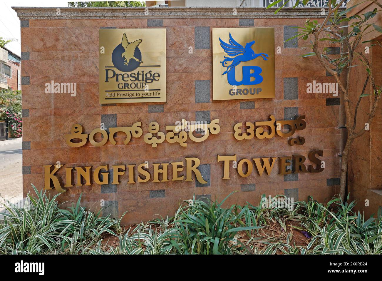 Name and logos on a wall infront of the Kingfisher Towers, Ashok Nagar ...