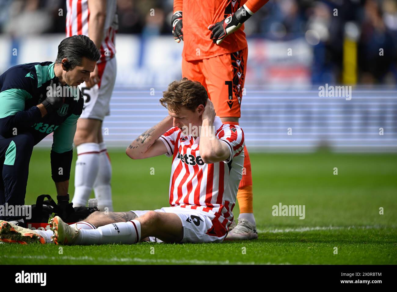 Wouter Burger of Stoke City is treated for a head injury during the Sky ...