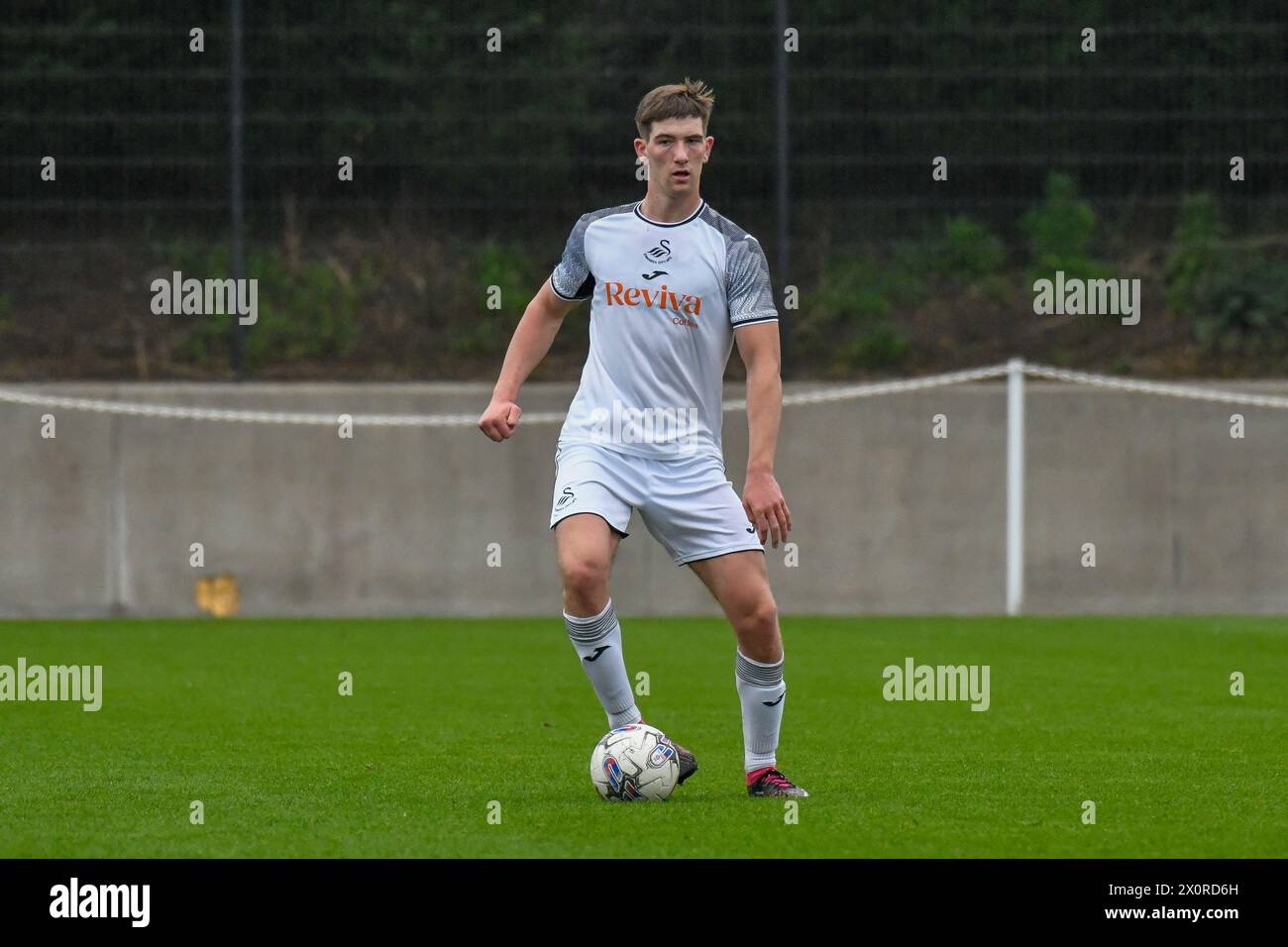 Landore, Swansea, Wales. 13 April 2024. Brogan Popham of Swansea City ...