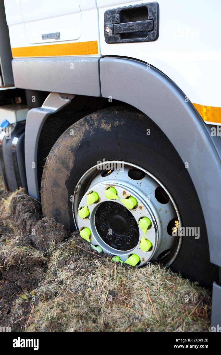 Articulated lorry wheels stuck in the mud in Scotland Stock Photo - Alamy