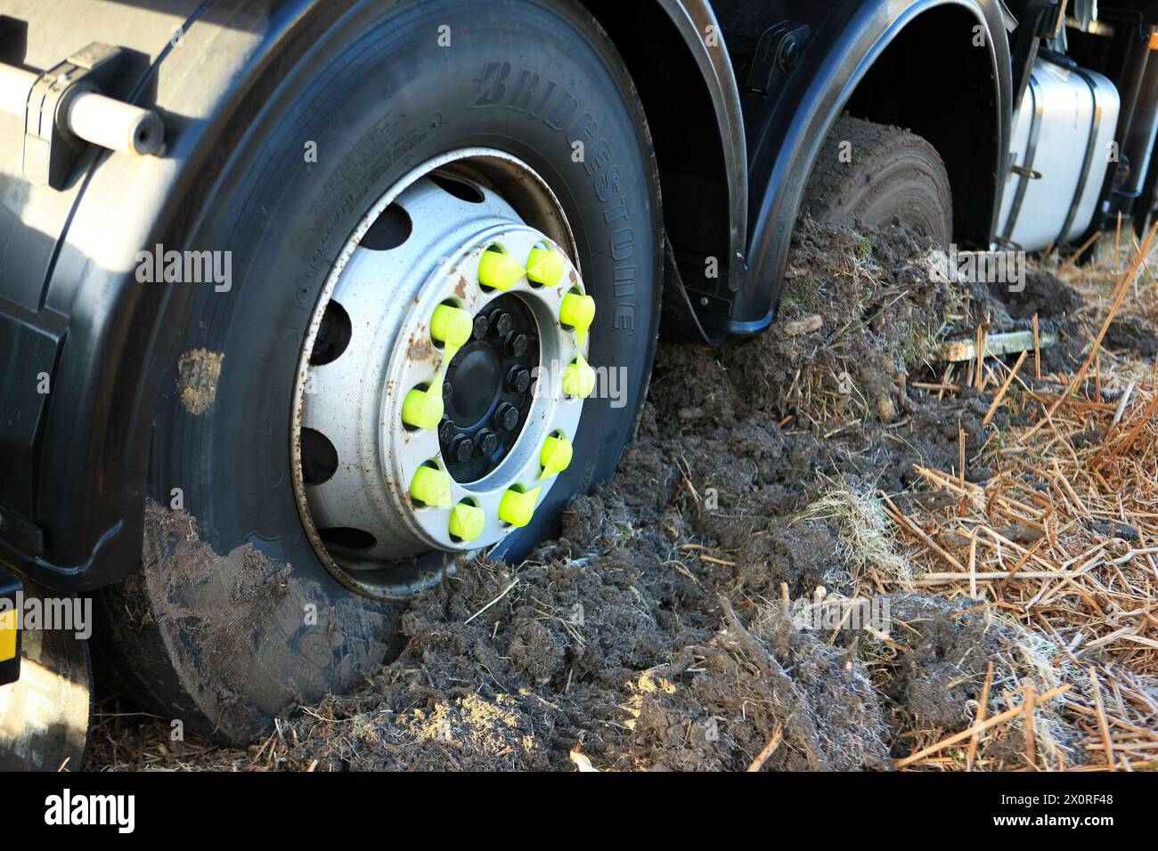 Articulated lorry wheels stuck in the mud in Scotland Stock Photo - Alamy