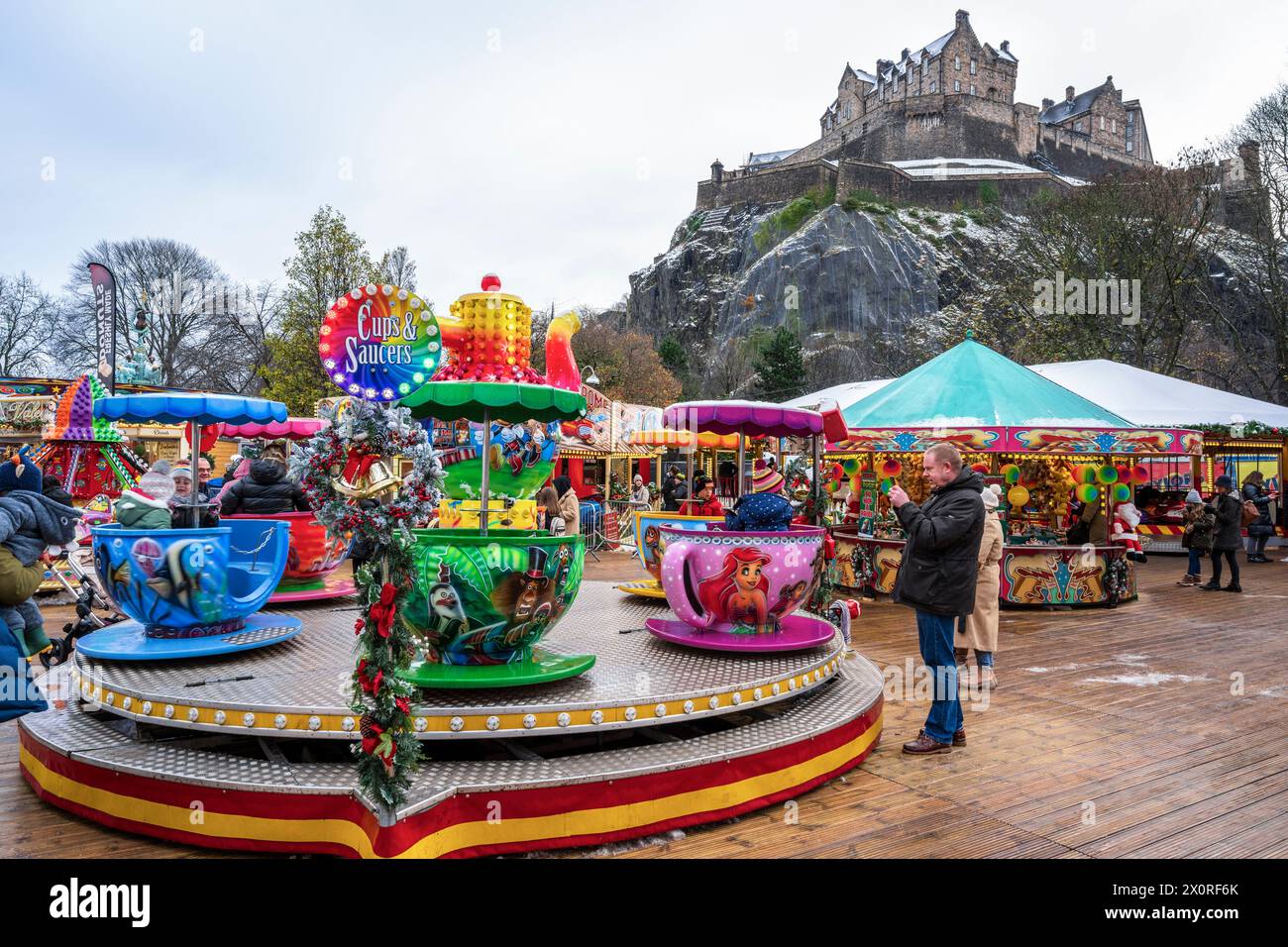 Christmas 2022 - Cup and Saucer fairground ride, with Edinburgh Castle ...