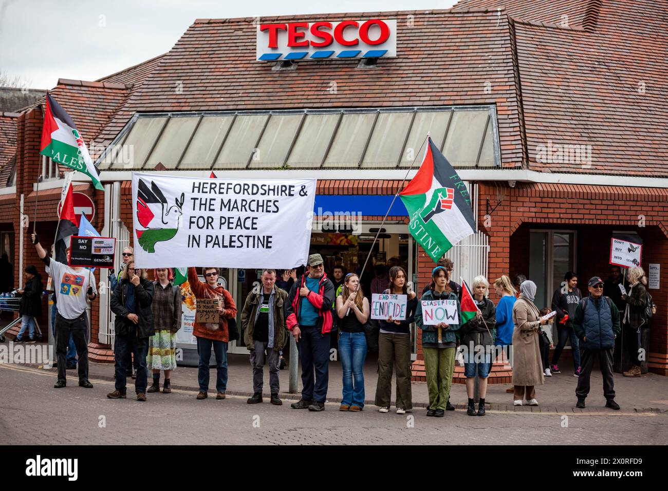 HEREFORD, UNITED KINGDOM - APRIL 13, 2024: Protestors are seen gathered ...