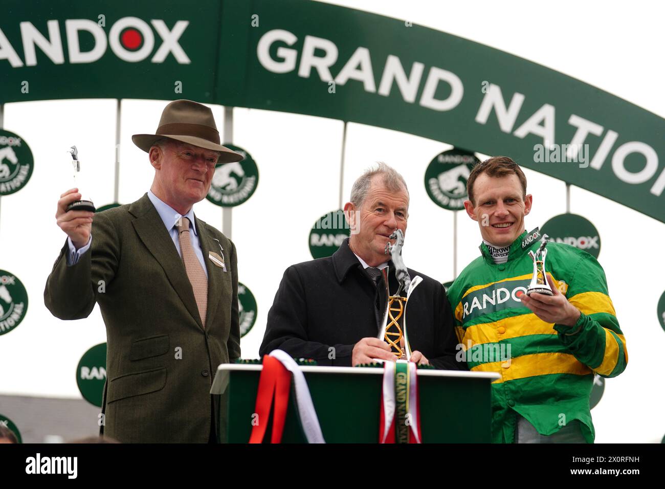 Paul Townend (right), trainer Willie Mullins (left) and owner of horse ...