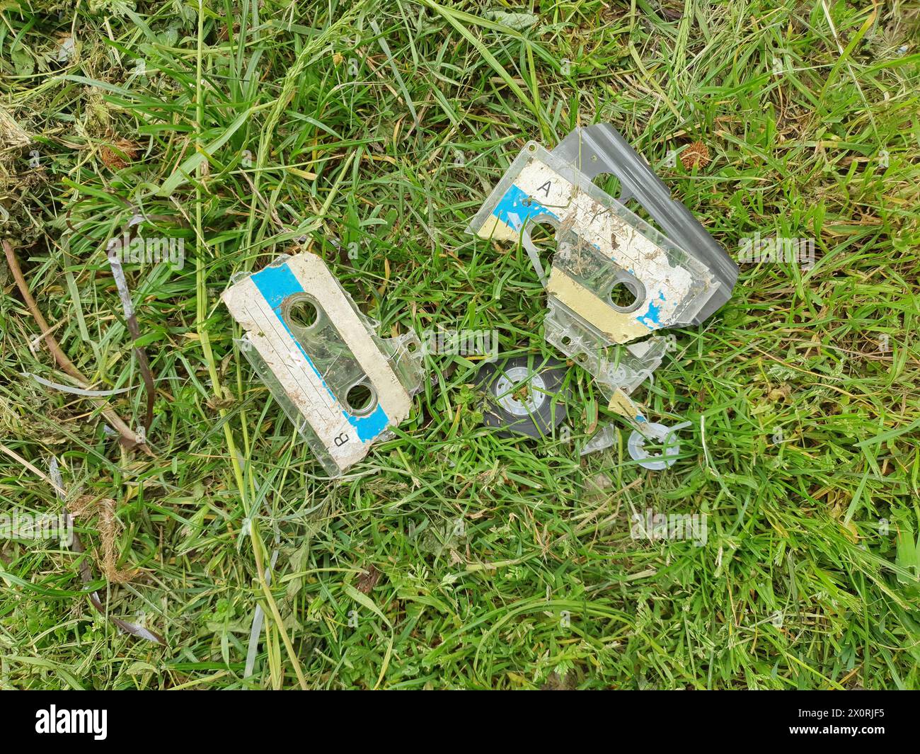 Vintage Broken Tape Cassette In The Grass Top View Stock Photo - Alamy