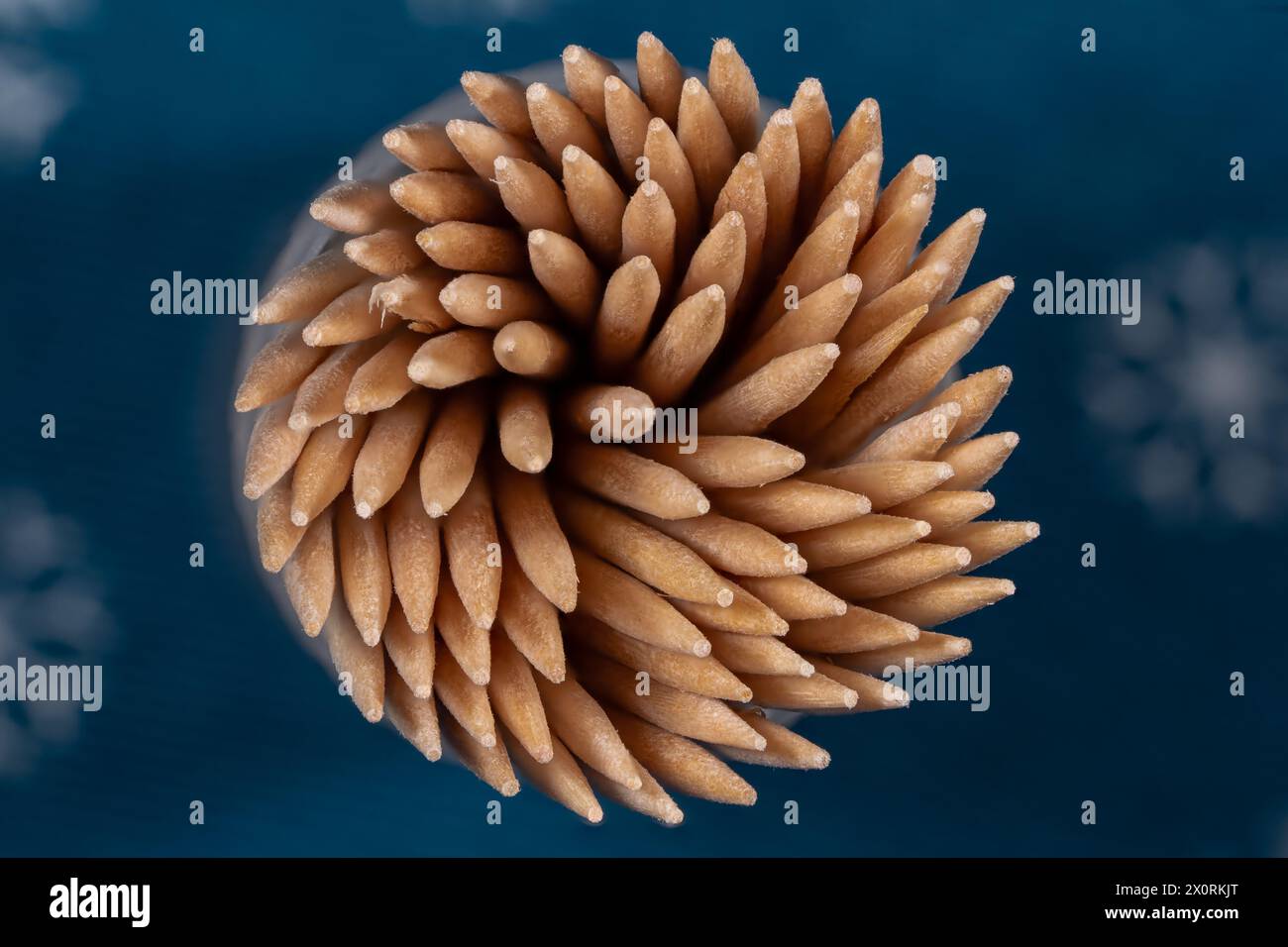 Set of wooden toothpicks arranged in a circular shape viewed from top ...