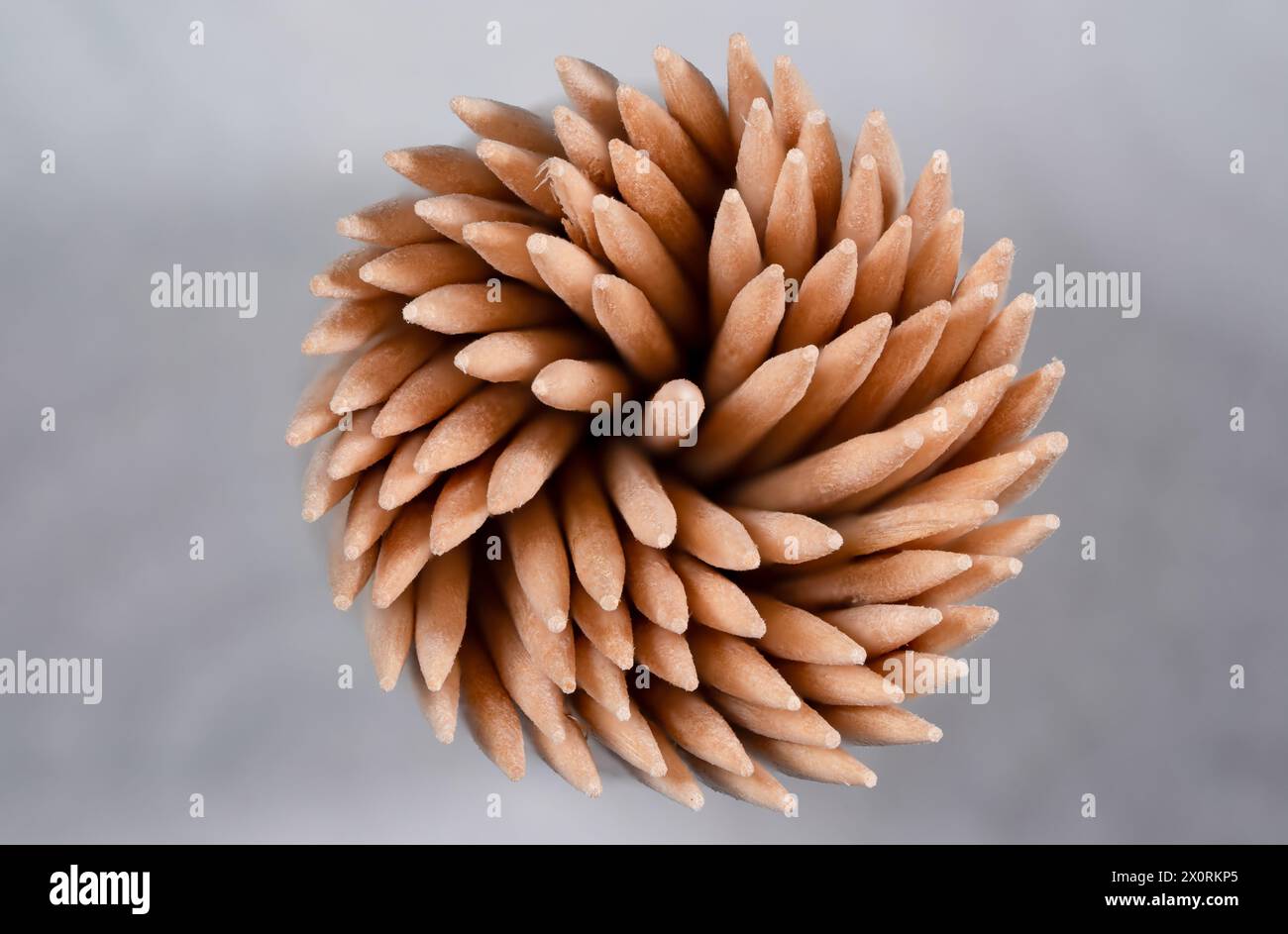 Set of wooden toothpicks arranged in a circular shape viewed from top ...