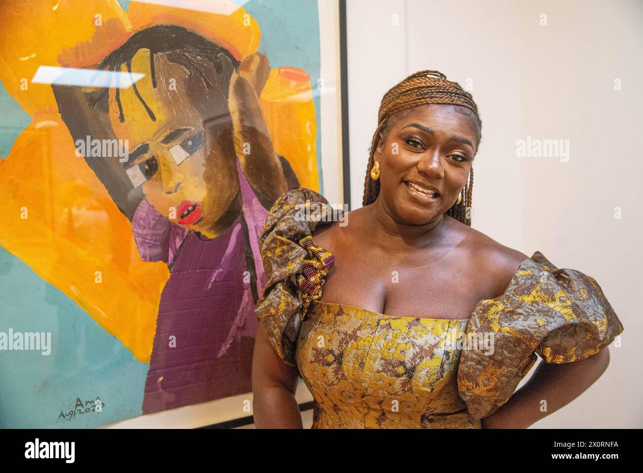 London, UK. 13th Apr, 2024. Dentaa Amoateng MBE poses by artwork and ...