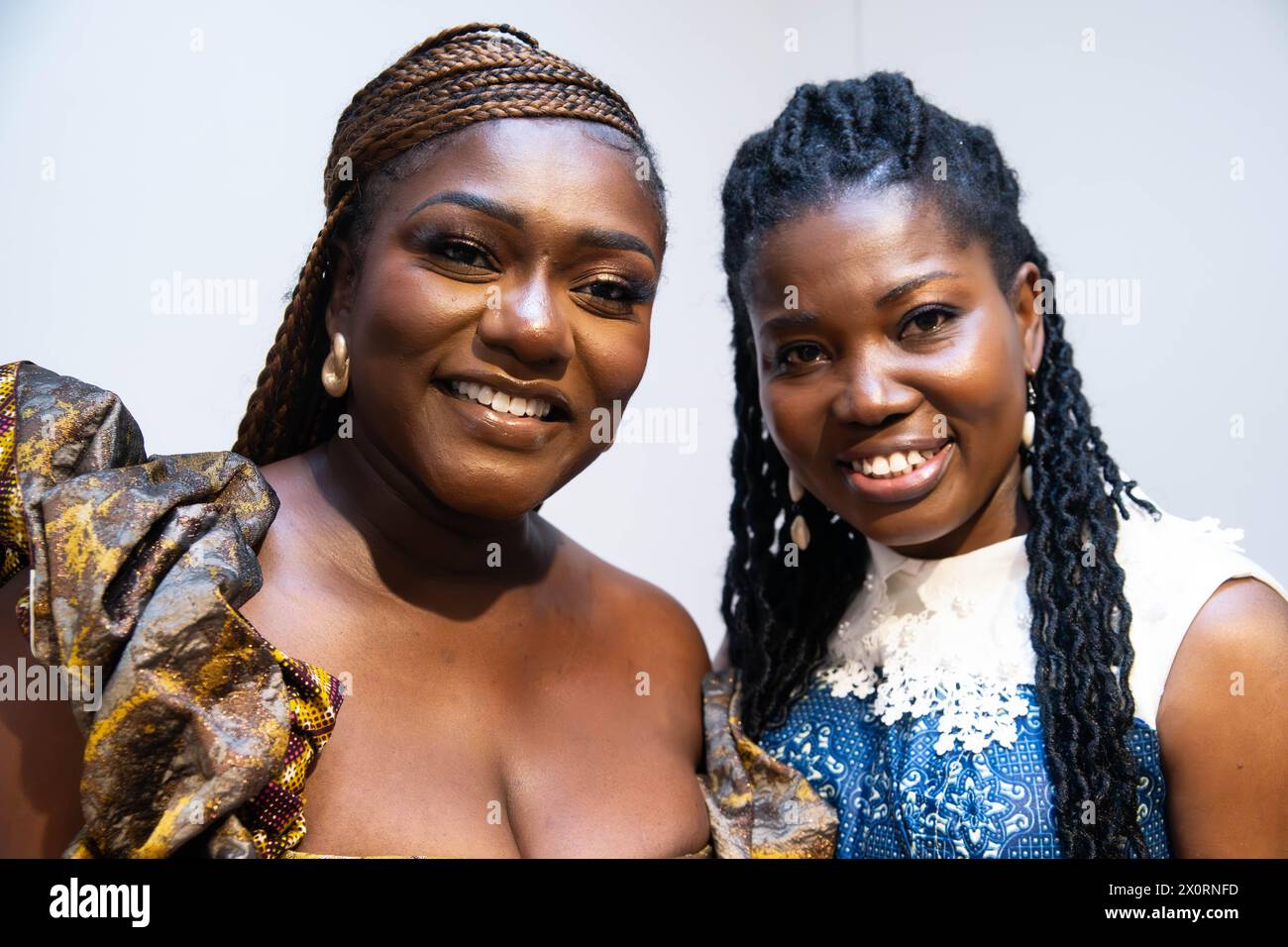 London, UK. 13th Apr, 2024. Dentaa Amoateng MBE camera left and GUBA at ...