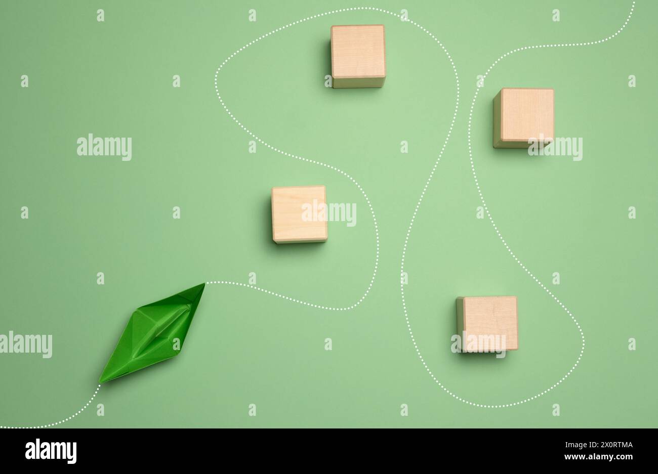 A green paper boat and a trajectory with obstacles, a detour around the ...