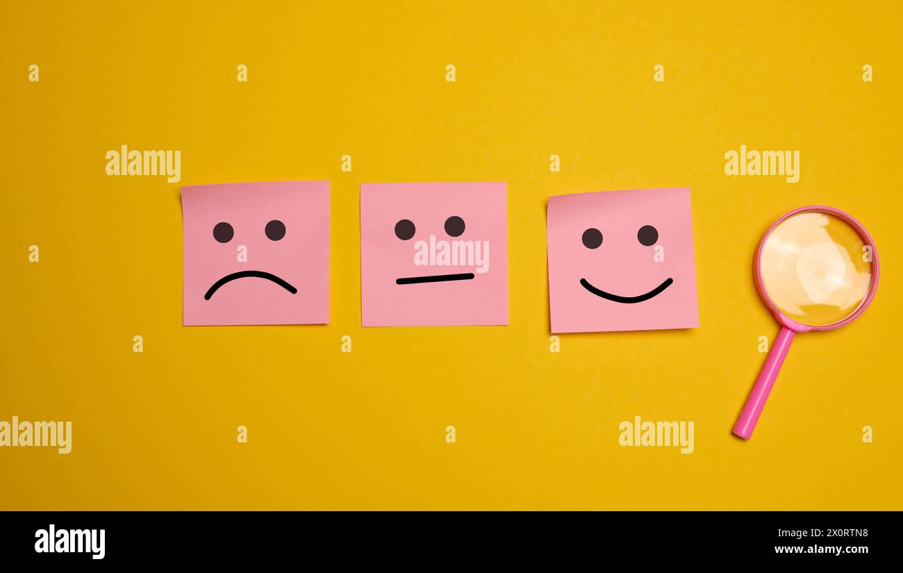 Drawn faces with different emotions on a sticker. Rating and quality ...