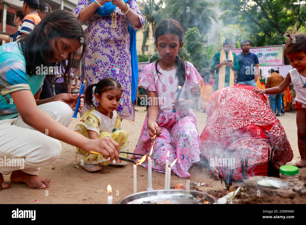 Hindu people perform rituals during the Charak Puja festival on the ...