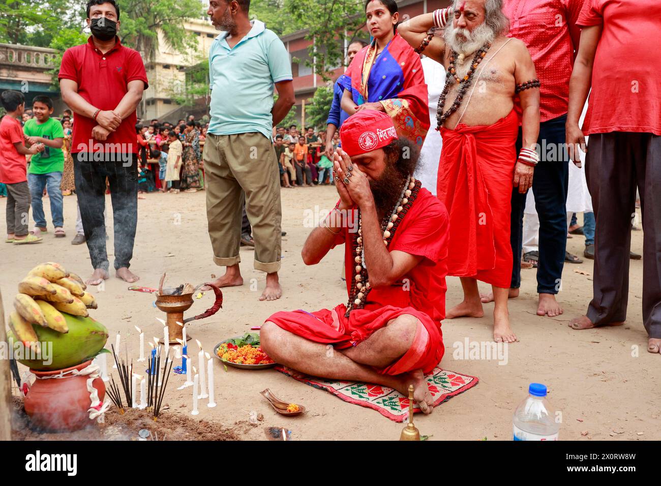 Hindu people perform rituals during the Charak Puja festival on the ...