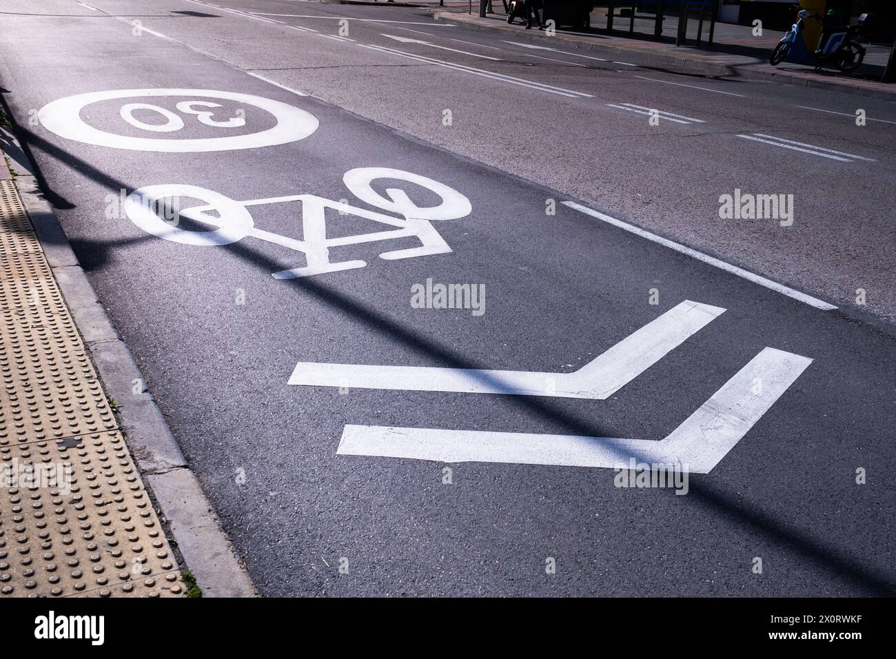 A bike lane in the heart of the city paved and delimited. There are ...