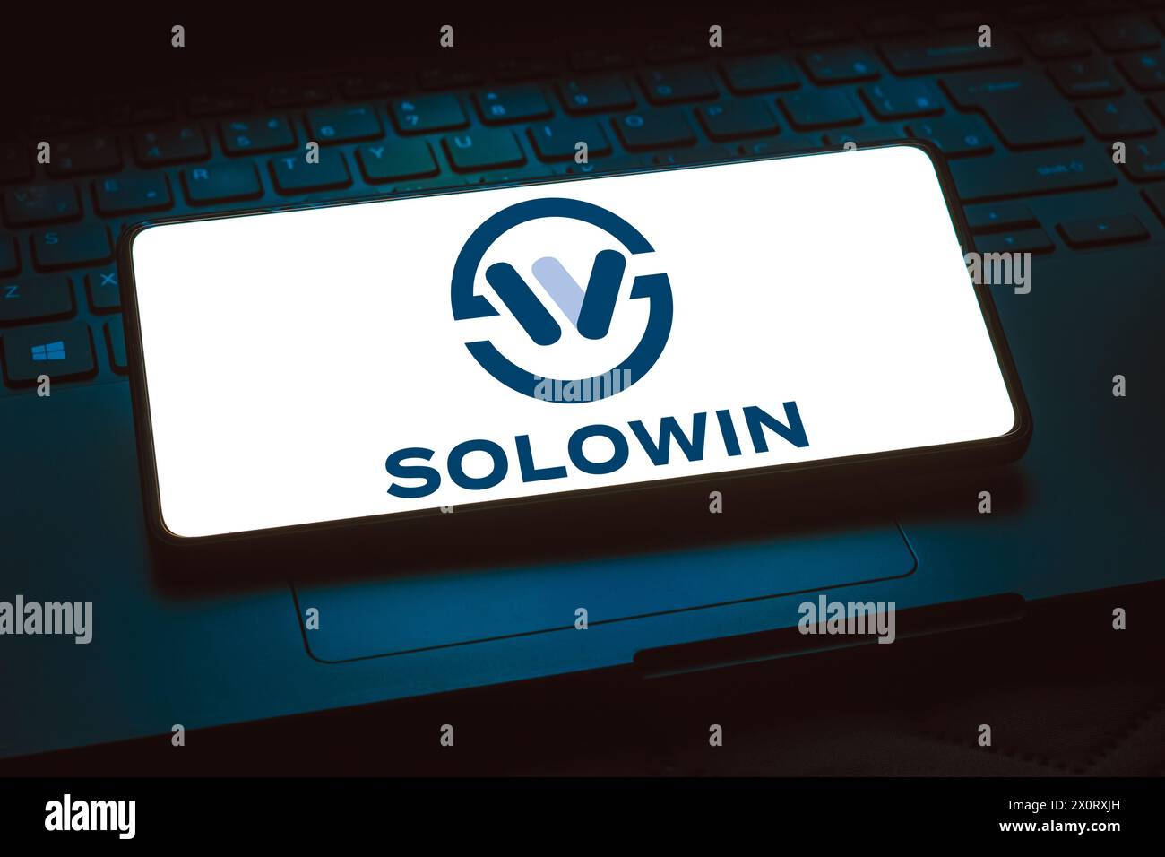 In this photo illustration, the Solowin Holdings logo is displayed on a ...